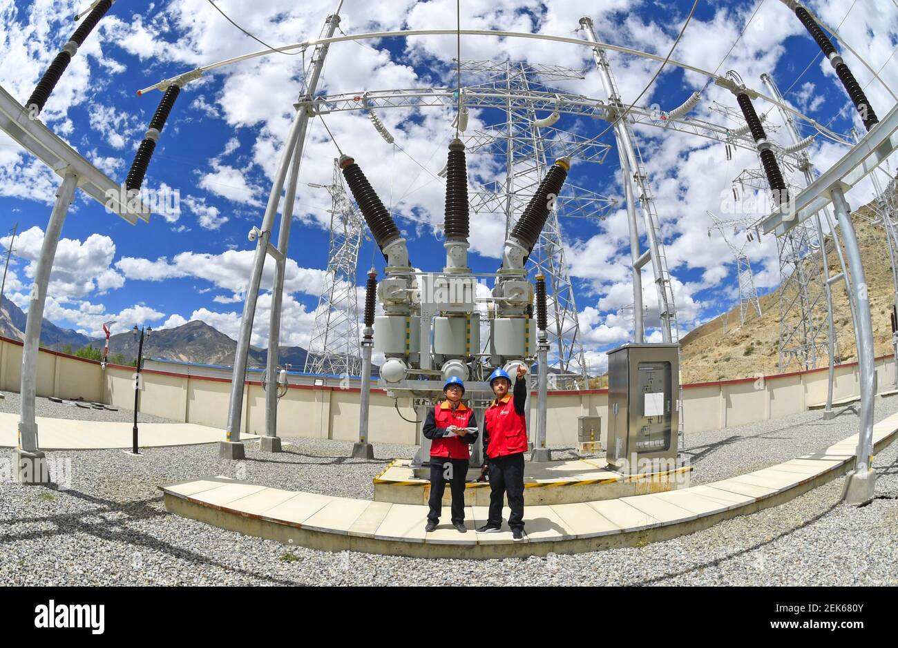 SHANNAN, CHINA - JUNE 17, 2020 - Members of the State Grid patrol the ...