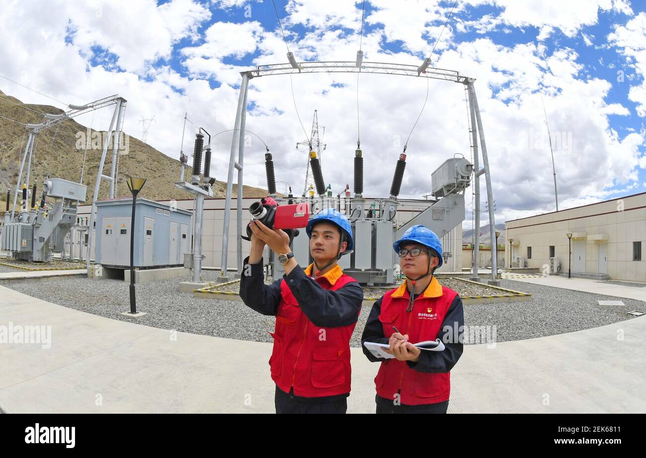 SHANNAN, CHINA - JUNE 17, 2020 - Members of the State Grid patrol the ...
