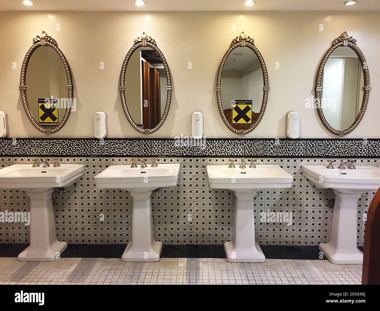 Social distance sign seen on the toilet at the shopping malls in ...