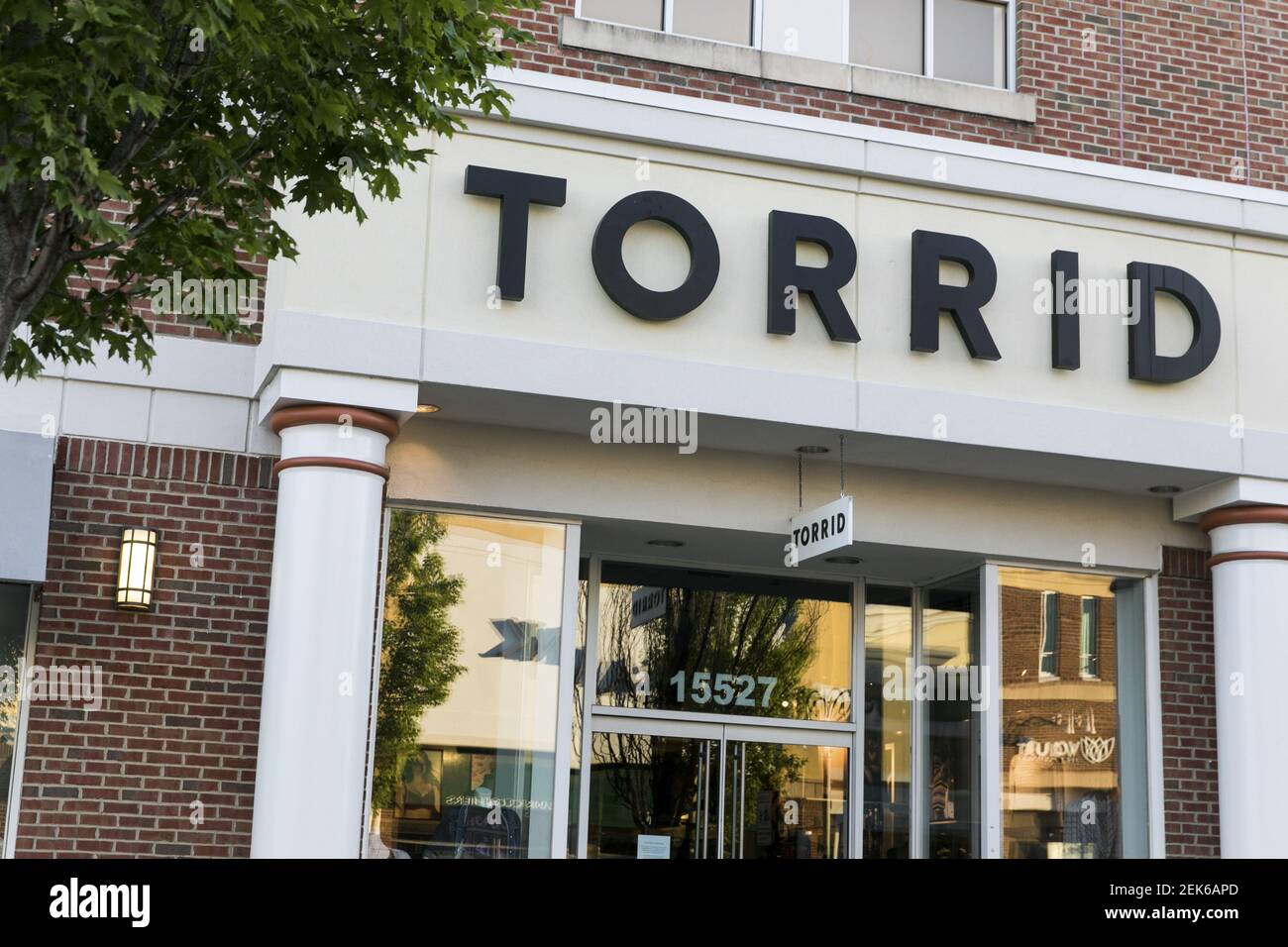 A logo sign outside of a Torrid retail store location in Bowie ...