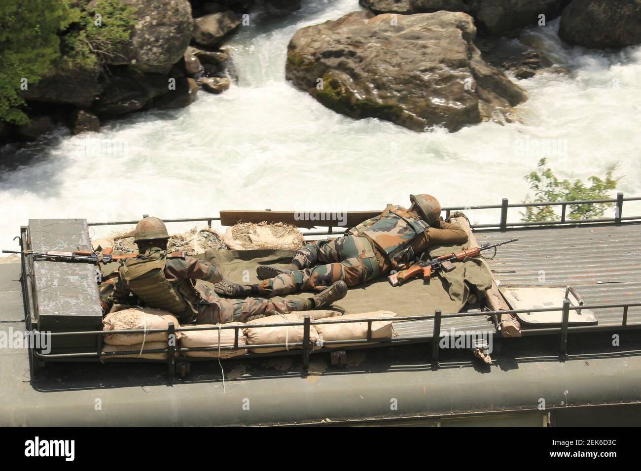 Indian army trooper sleeping as army convoy en-route to Ladakh, the ...