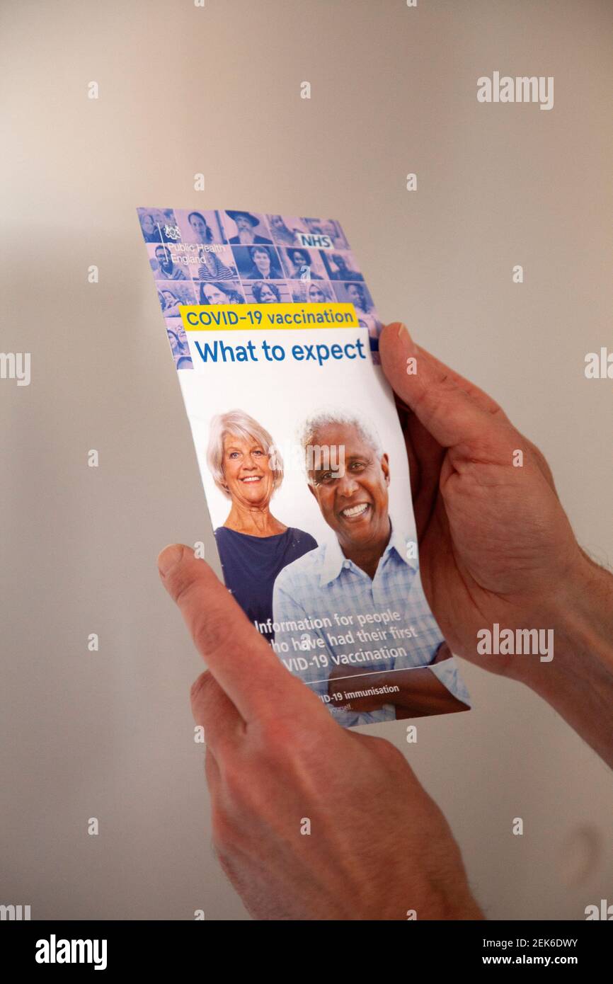 Hand holding leaflet hi-res stock photography and images - Alamy