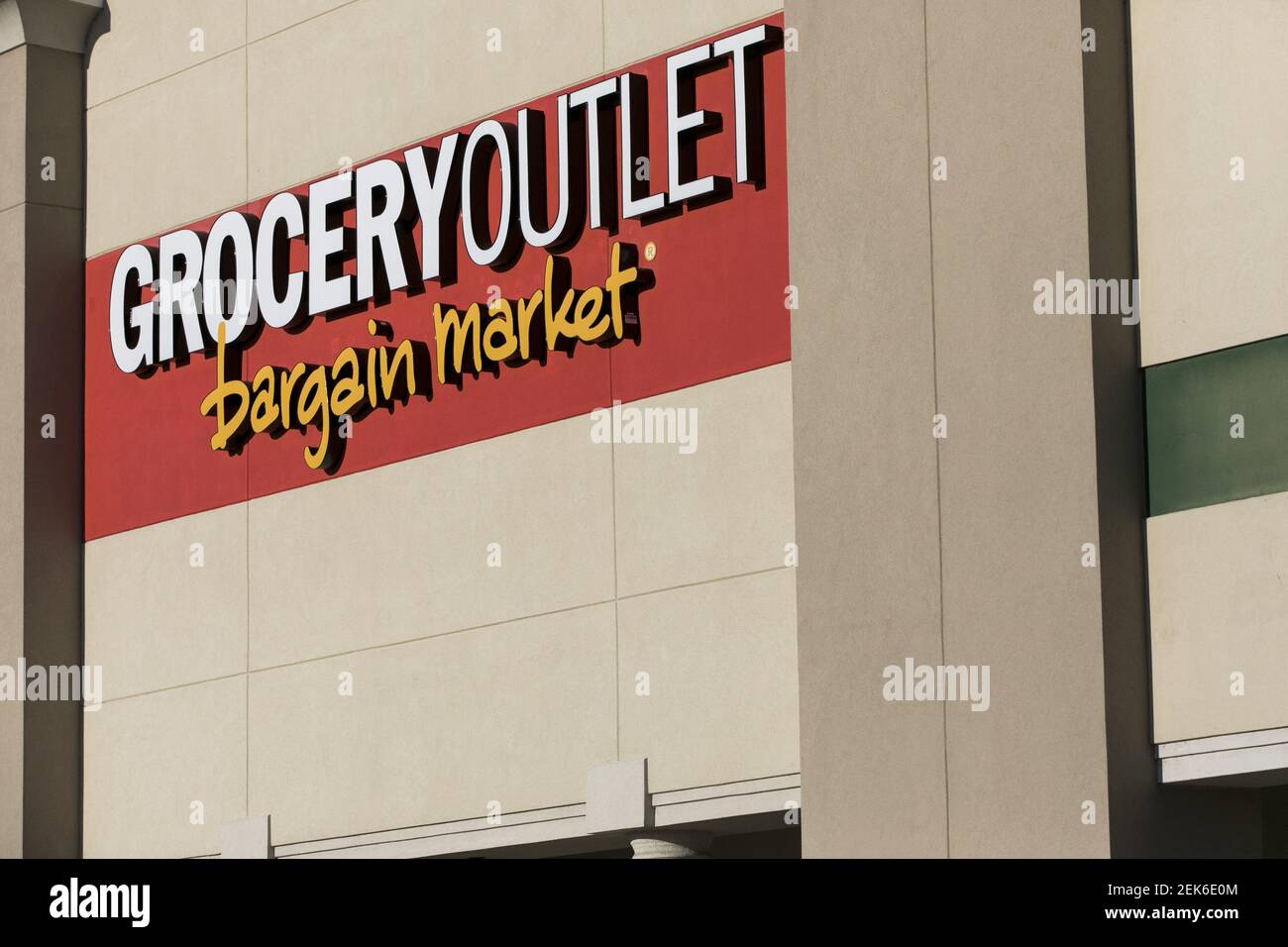 A logo sign outside of a Grocery Outlet retail store location in ...