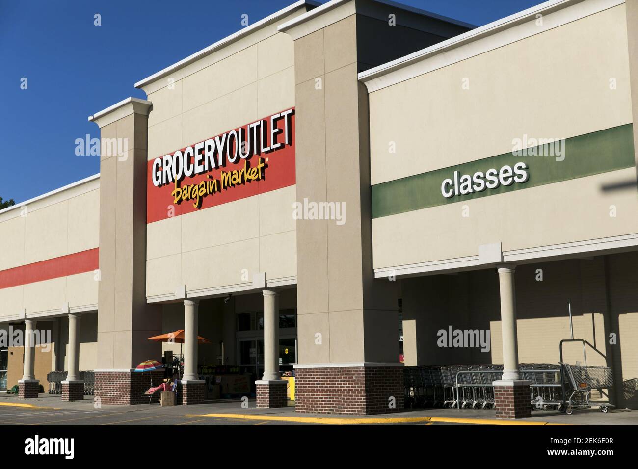A logo sign outside of a Grocery Outlet retail store location in ...