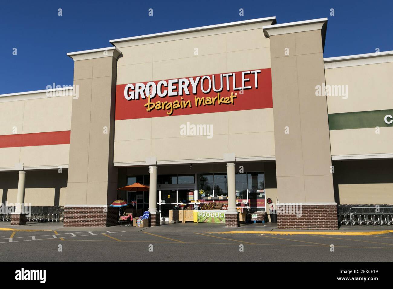 A logo sign outside of a Grocery Outlet retail store location in ...