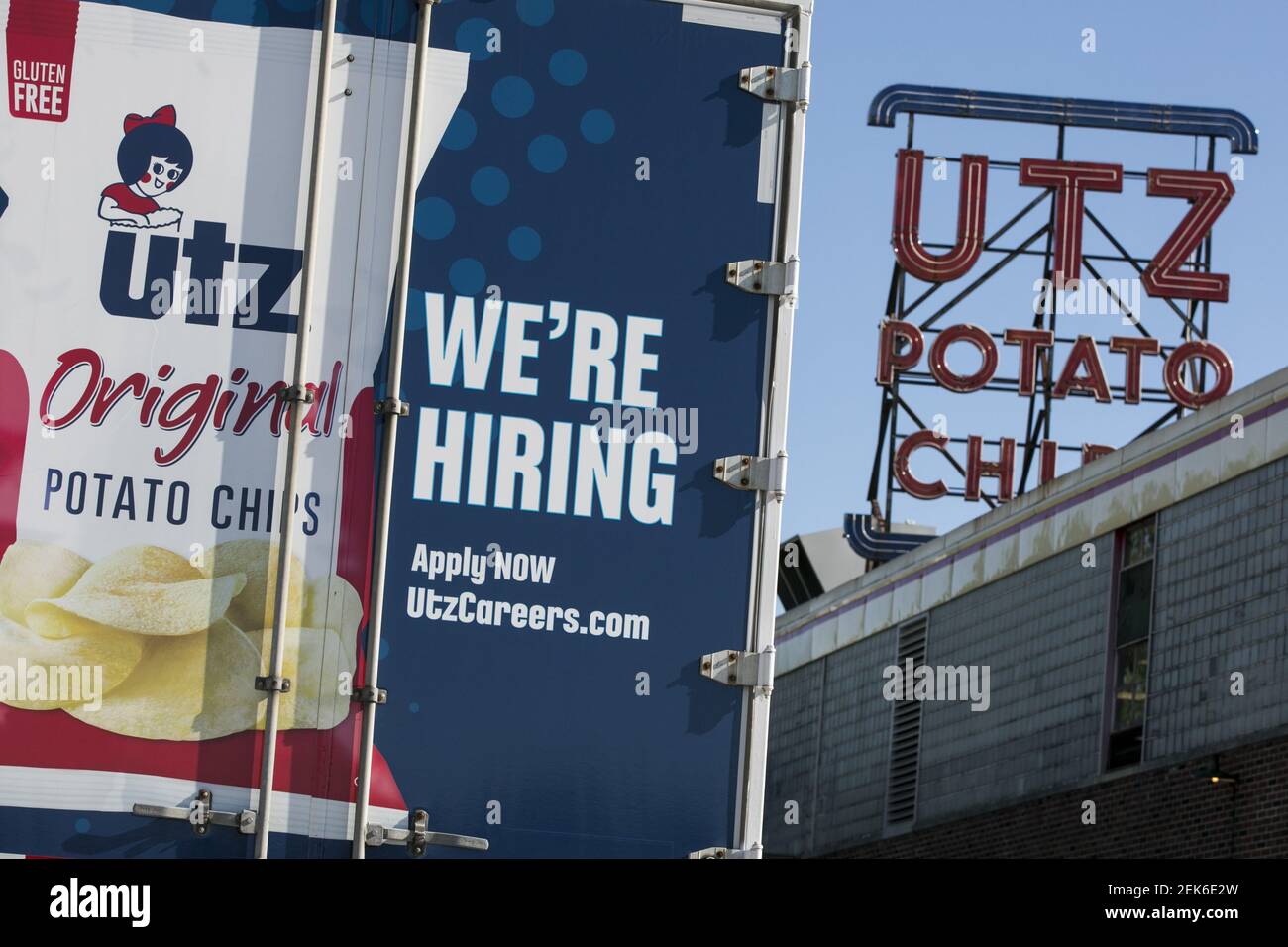 A logo sign outside of a facility occupied by Utz Quality Foods in ...