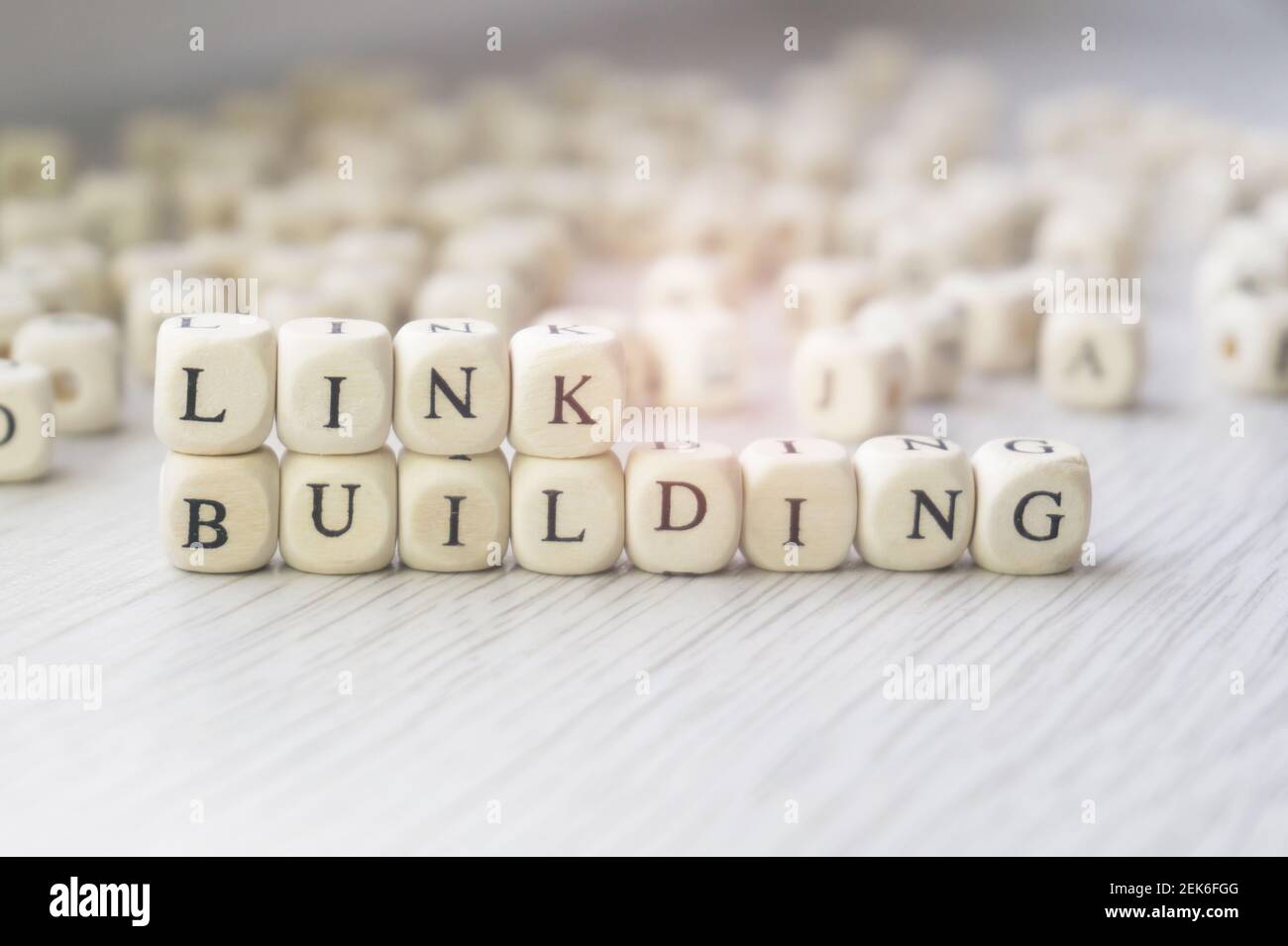 Link building words written in wooden cubes Stock Photo - Alamy