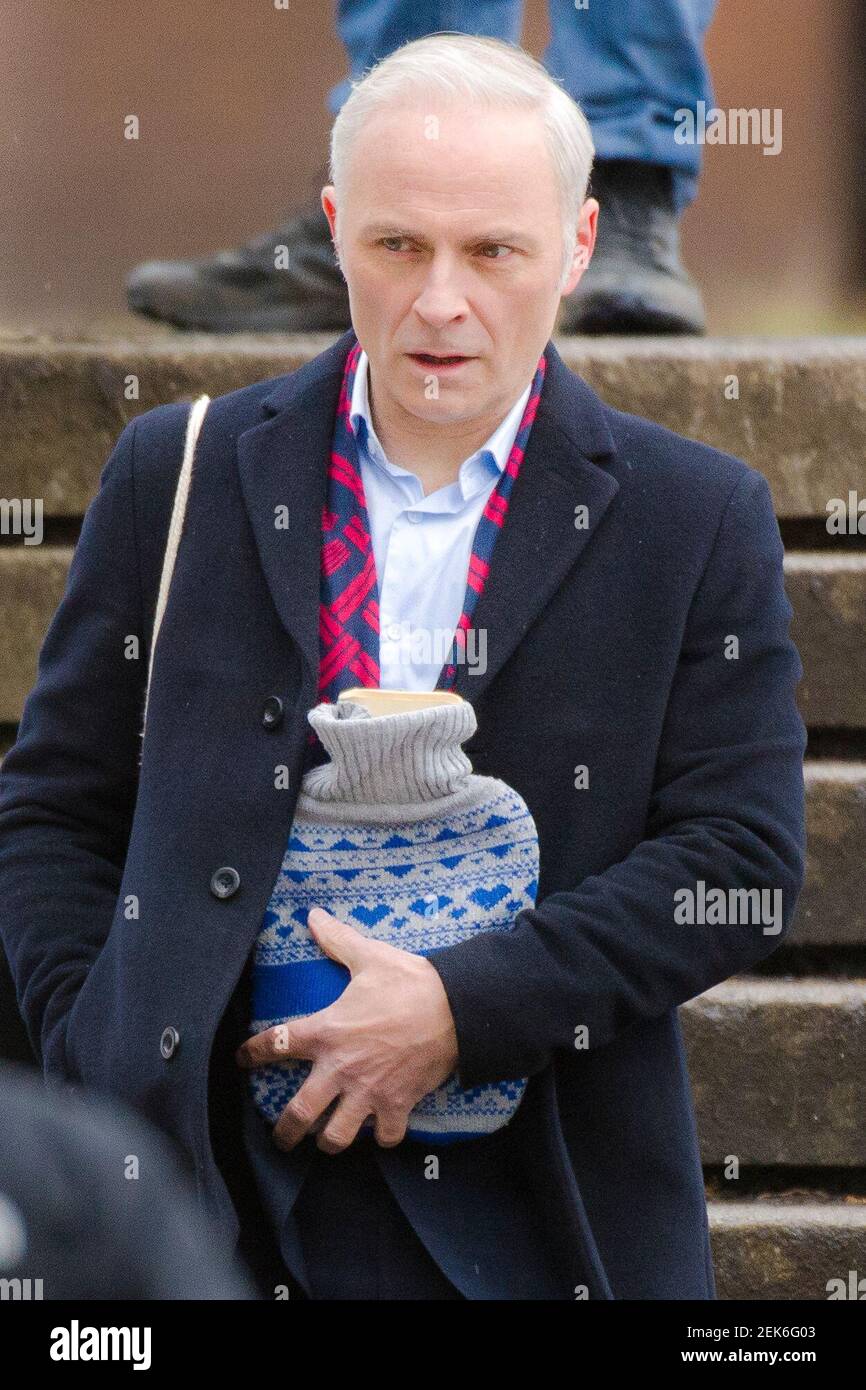 Mark Bonnar is spotted holding a hot water bottle as he stars in BBC's ...