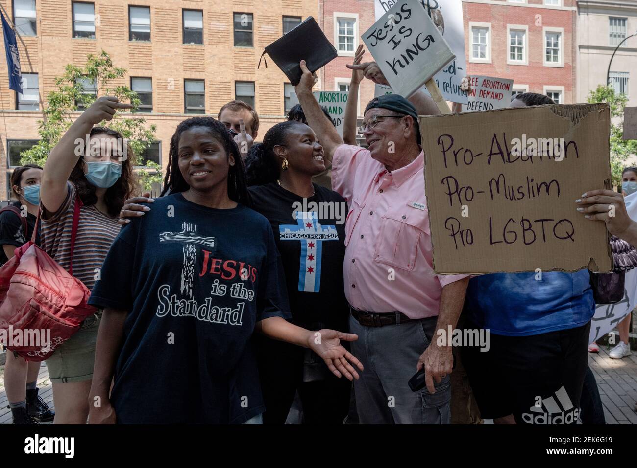 Surrounded by pro-choice activists, far-right minister Flip Benham ...