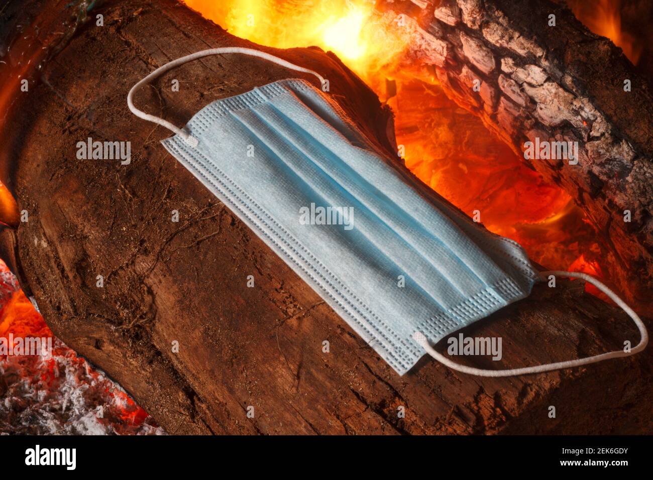 concept of the end of surgical masks, end of covid-19, mask burning in ...