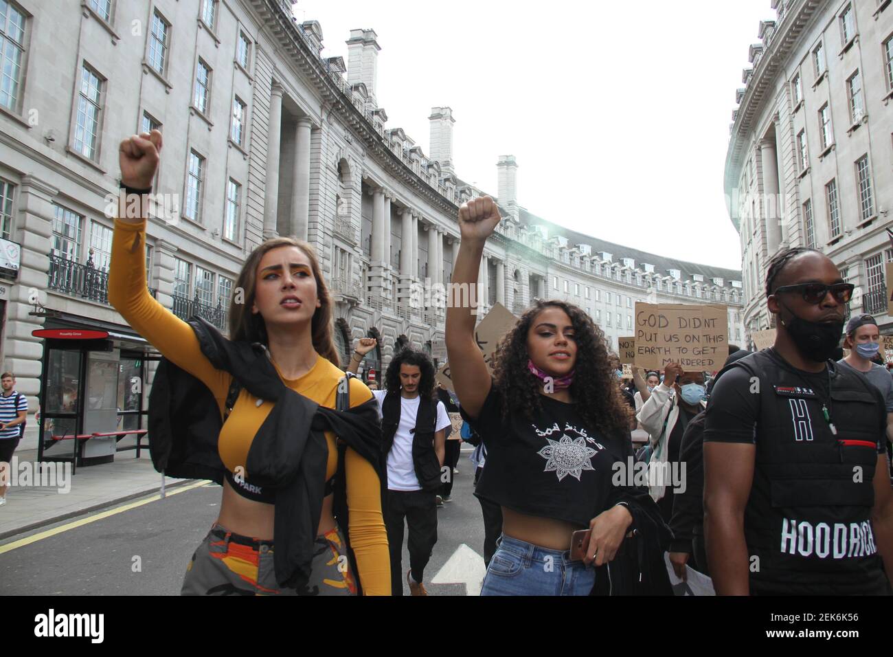 Protesters march through Regents Street while chanting slogans during ...
