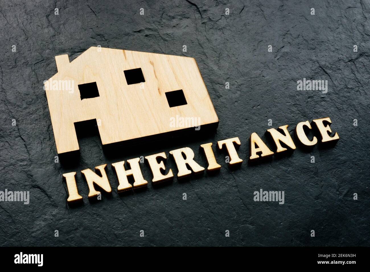 Wooden home as symbol of property and word inheritance Stock Photo - Alamy