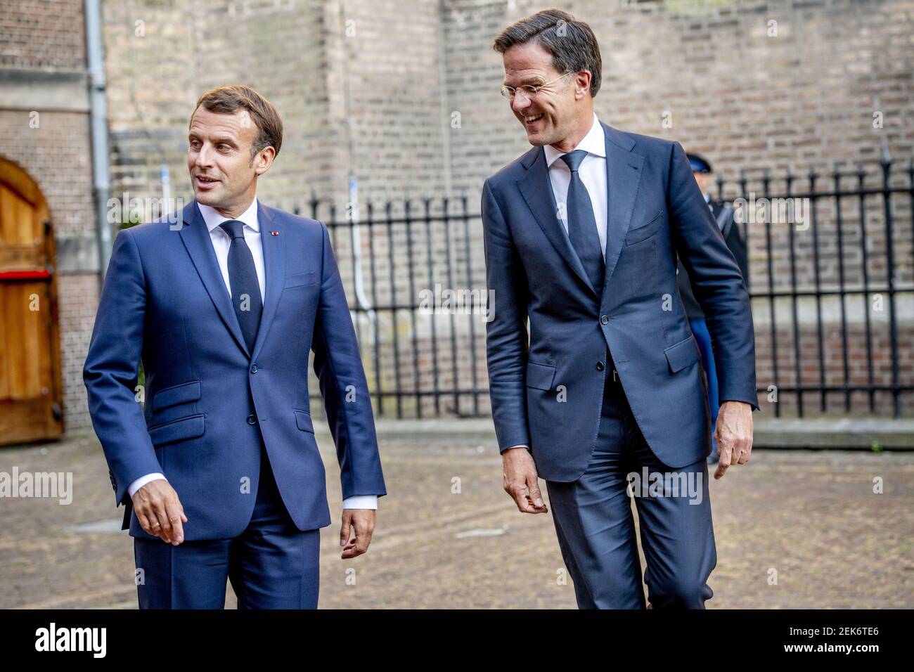 President Emmanuel Macron (L) seen talking with Prime Minister Mark ...