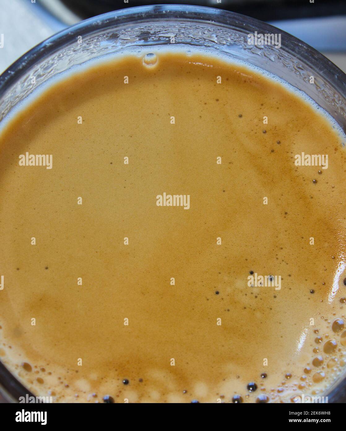 Cream of a freshly made coffee with overhead view Stock Photo - Alamy
