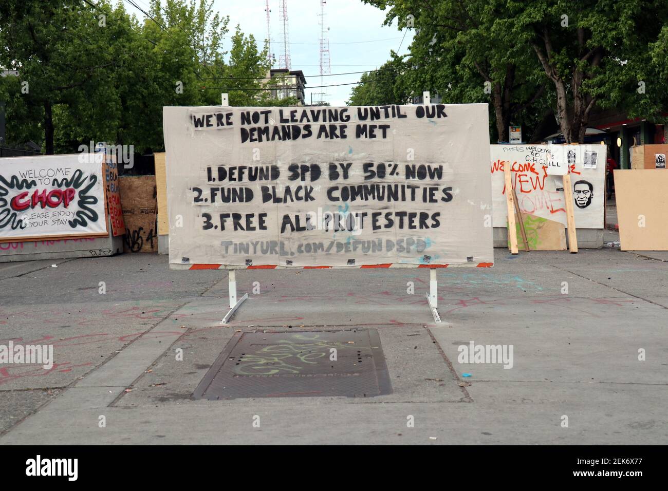 A placard seen outside the western wall of Seattle's Capitol Hill ...