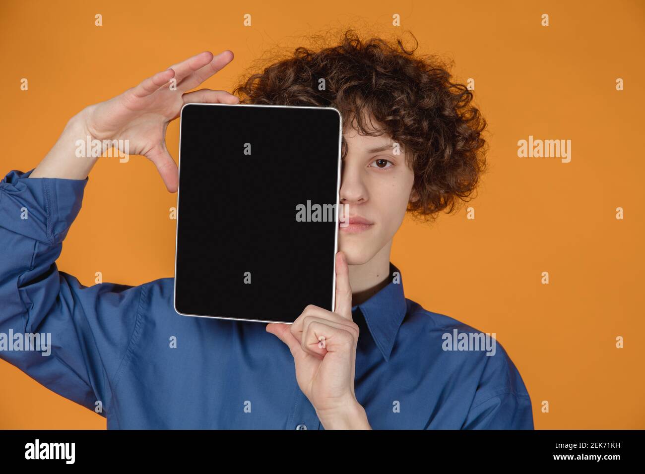 Blank screen. Caucasian handsome young man's portrait isolated on ...