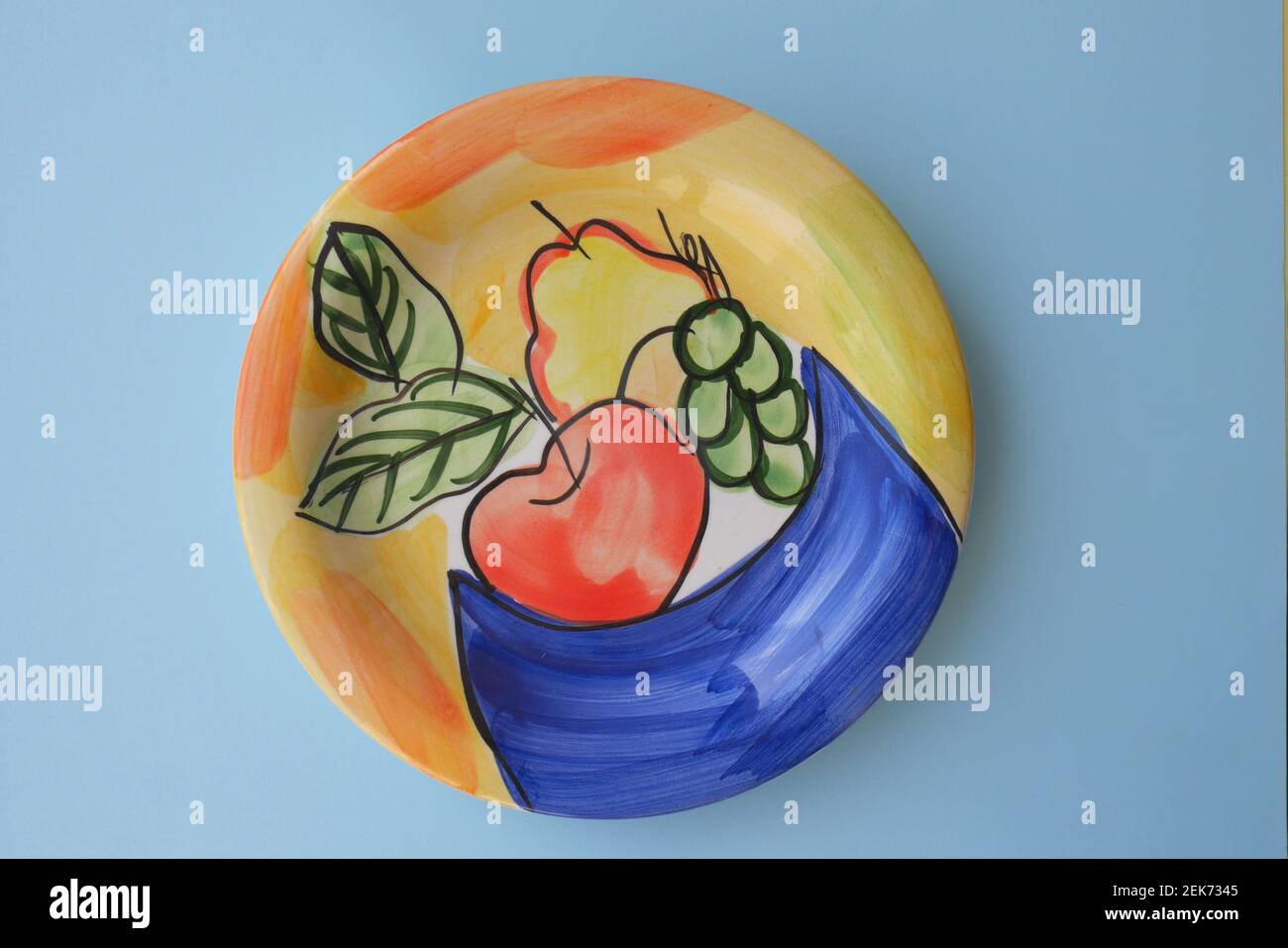 Empty ceramic side plate with a fruit design Stock Photo - Alamy