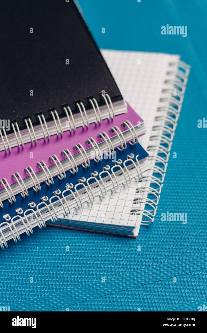 colorful notepads paper work office work desk blue background Stock ...