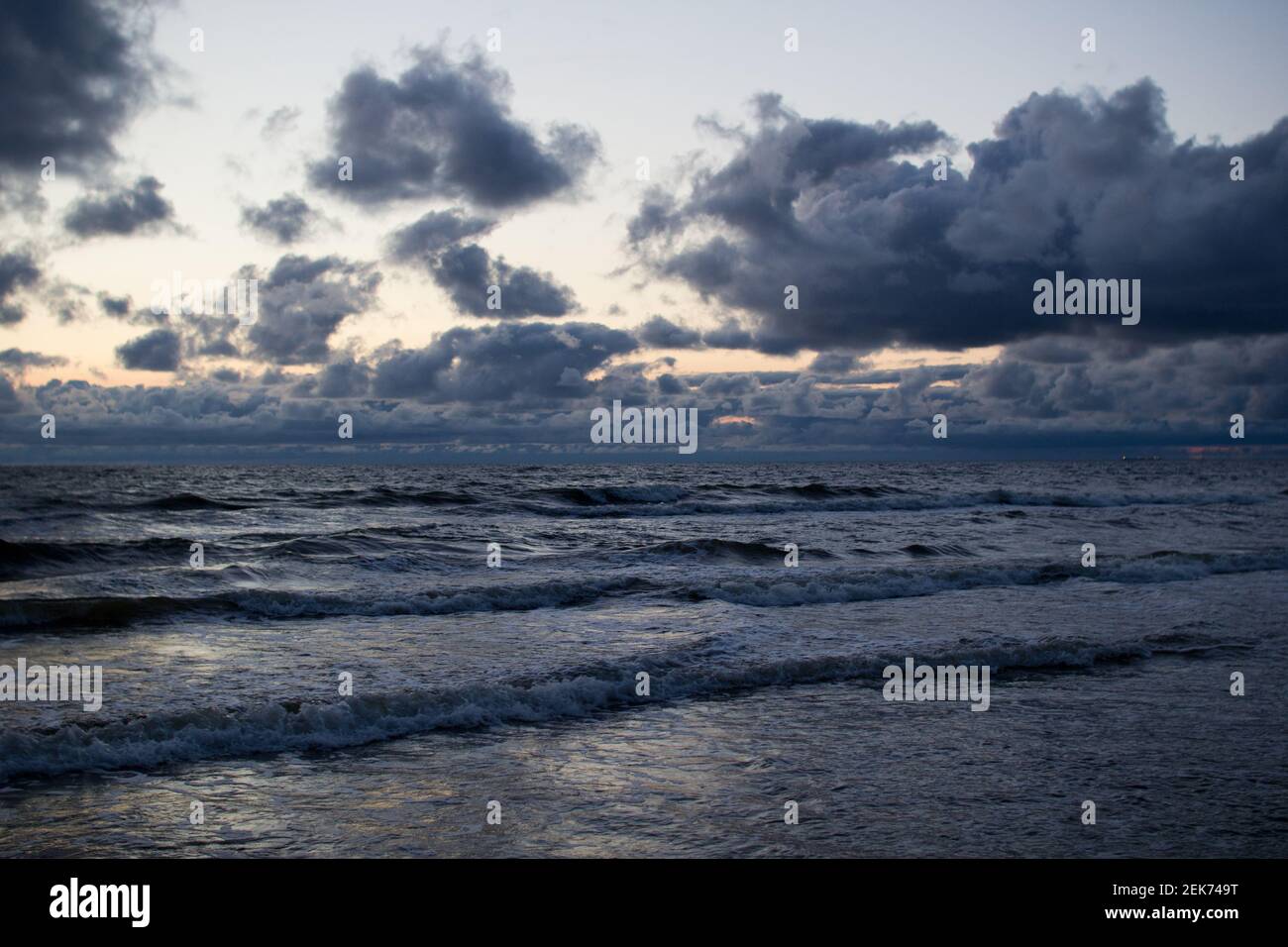 Evening seascape with clouds and waves. Dramatic Seascape Stock Photo ...
