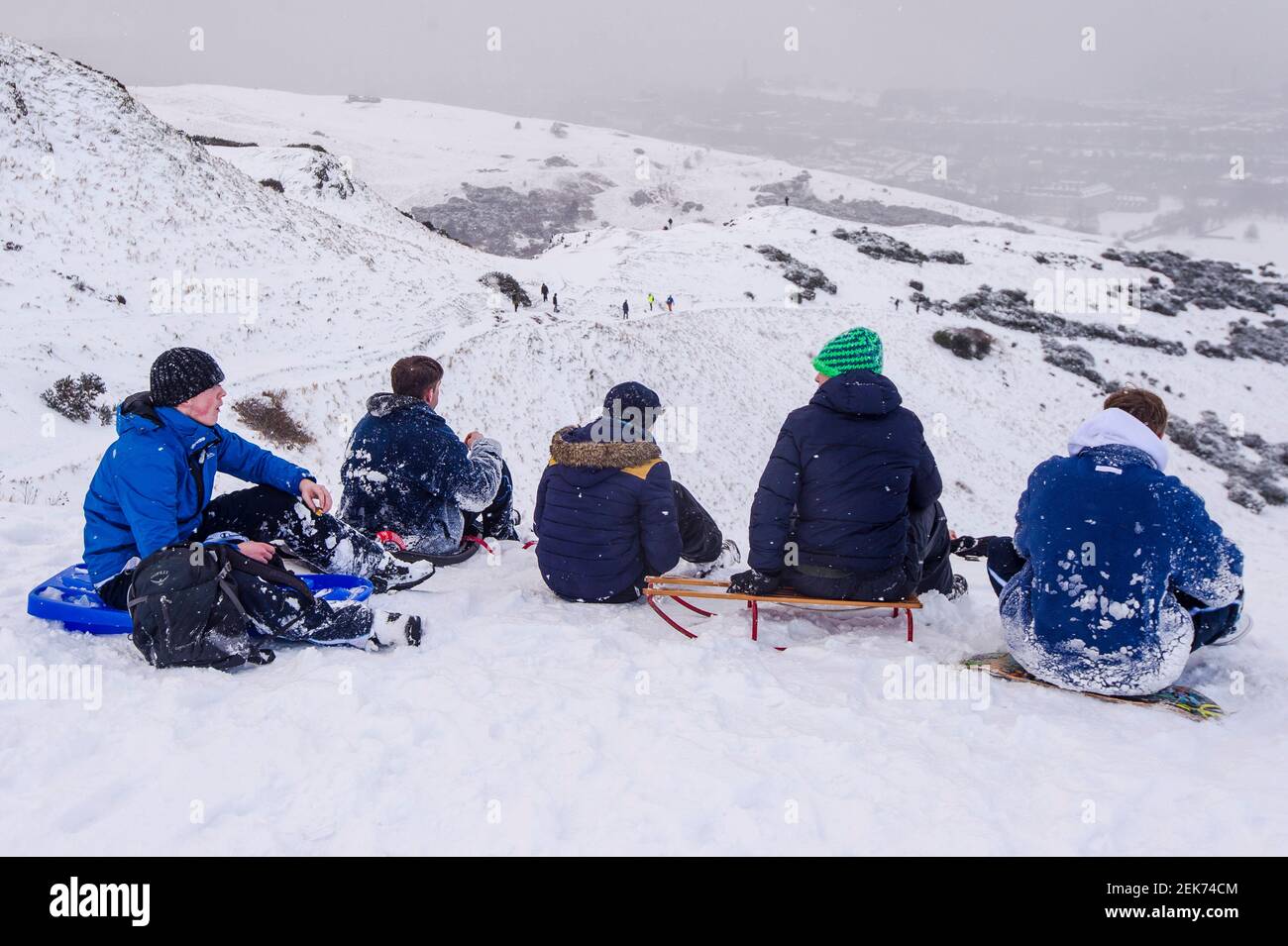 Skier's, snowboarders and the public enjoy winter scenes from Arthur's Seat, as it is covered in ...