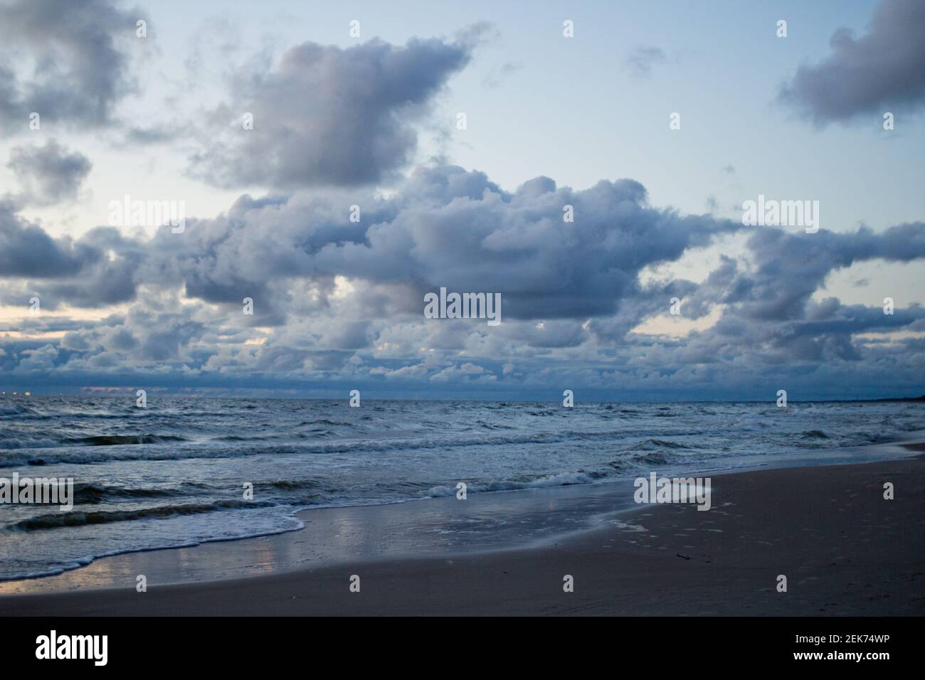 Evening seascape with clouds and waves. Dramatic Seascape Stock Photo ...