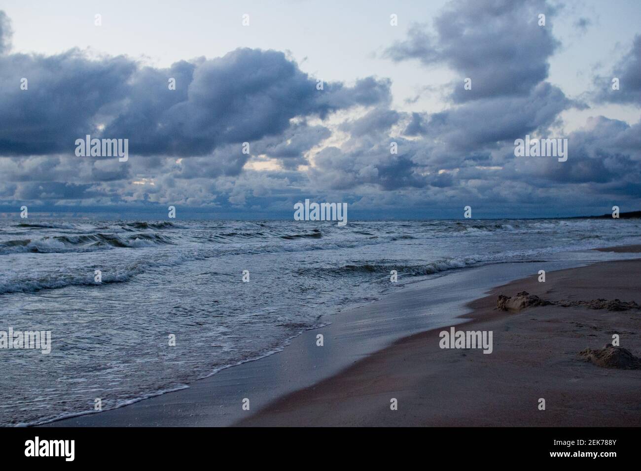 Evening seascape with clouds and waves. Dramatic Seascape Stock Photo ...