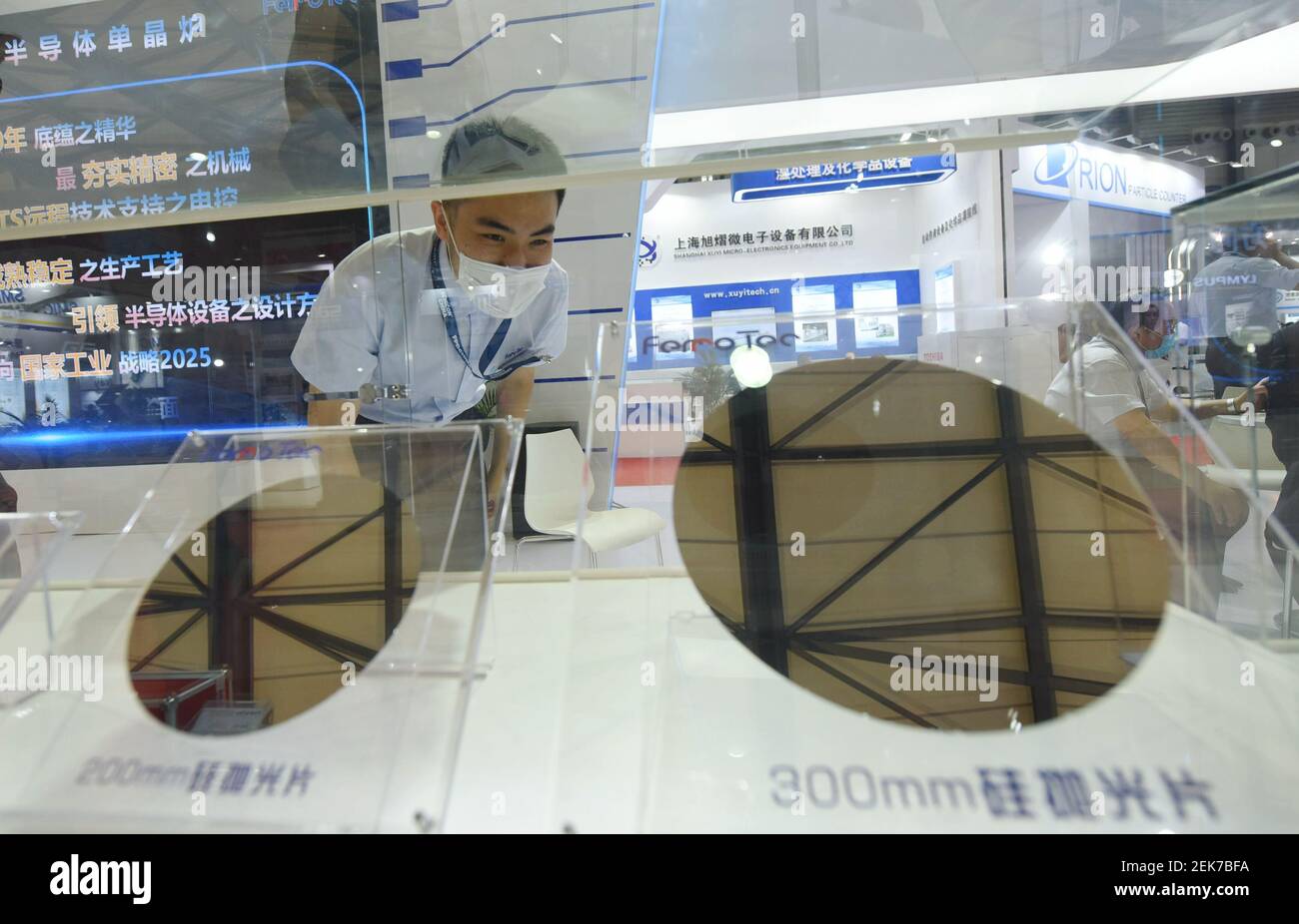 SHANGHAI, CHINA - JUNE 27, 2020 - Visitors watch domestic 12 inch (300 ...
