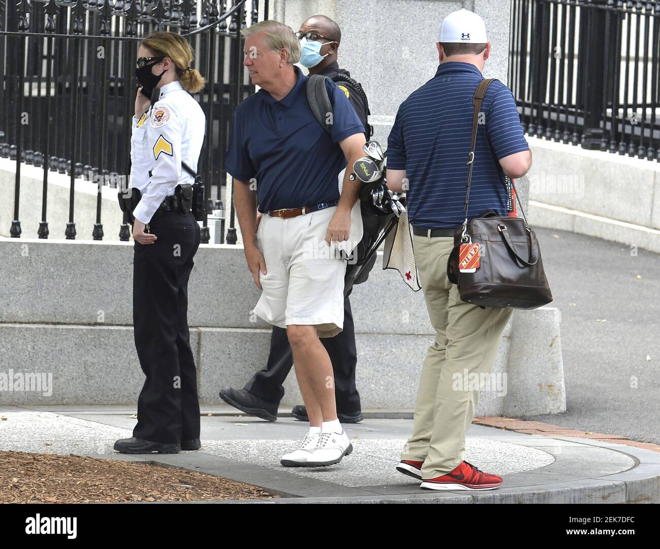 Sen. Lindsey Graham of South Carolina (C), not wearing a mask for ...