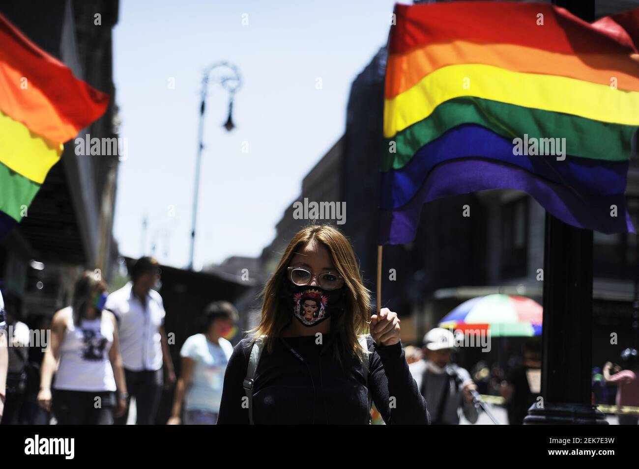 MEXICO CITY, MEXICO - JUNE 27: A member of LGBT holds a Rainbow flag ...