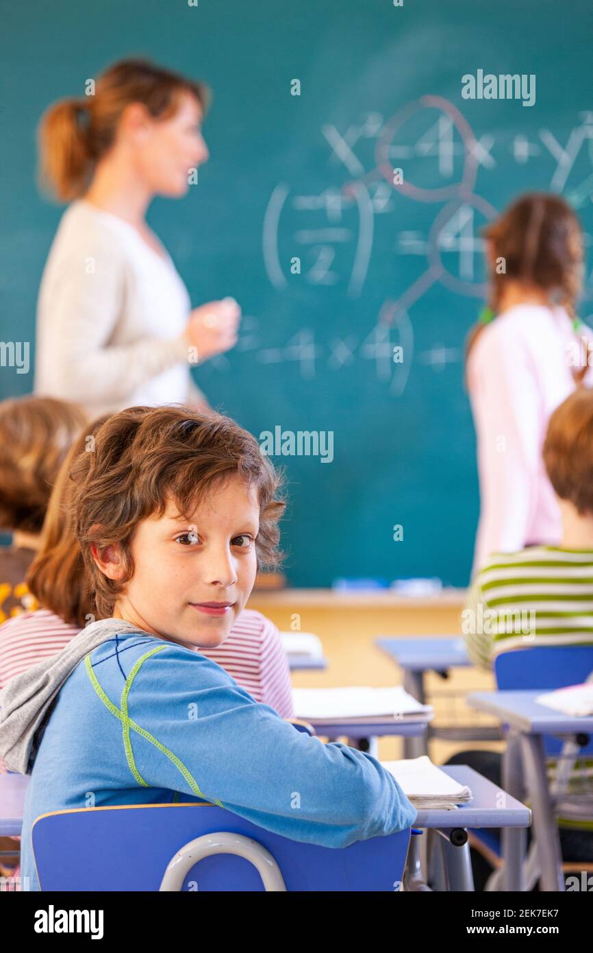 Children studying mathematics in an elementary school classroom Stock ...