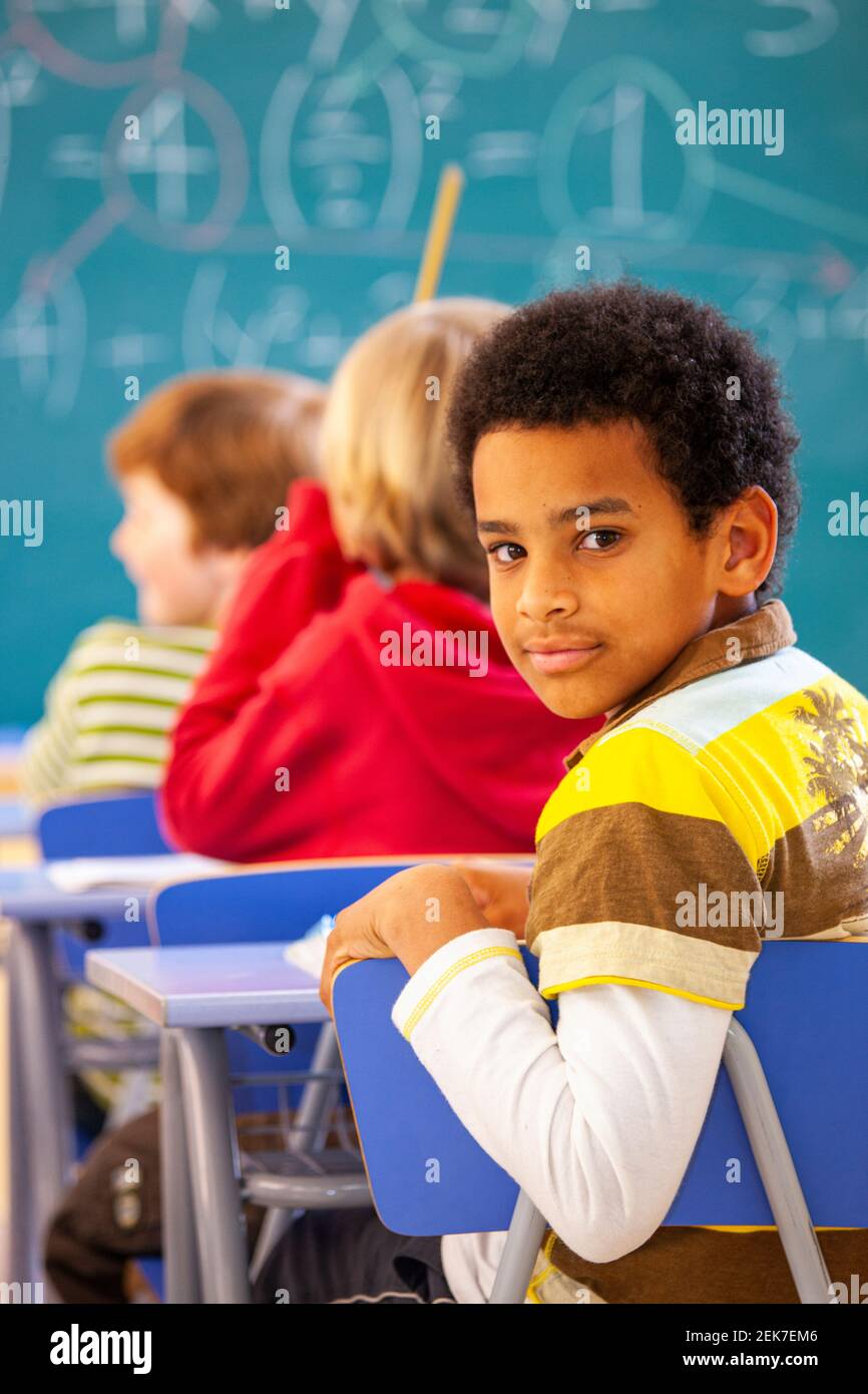 Children studying mathematics in an elementary school classroom Stock ...