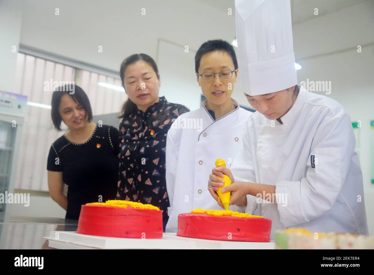 NANTONG, CHINA - JUNE 29, 2020 - Students make cakes to celebrate the ...