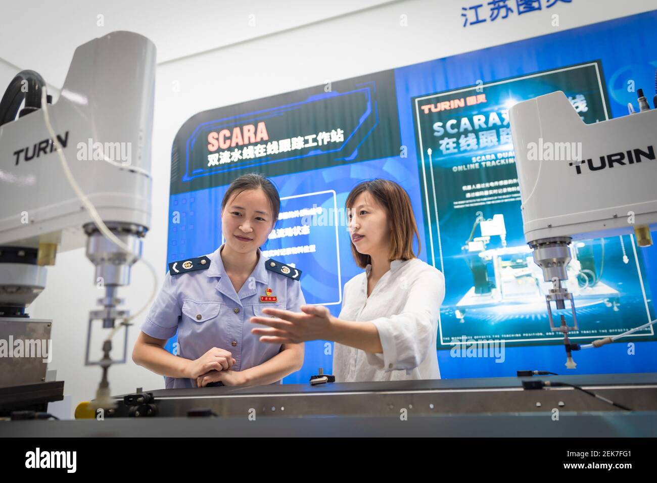 HAI'AN, CHINA - JUNE 29, 2020 - A tax official knows about high-end ...