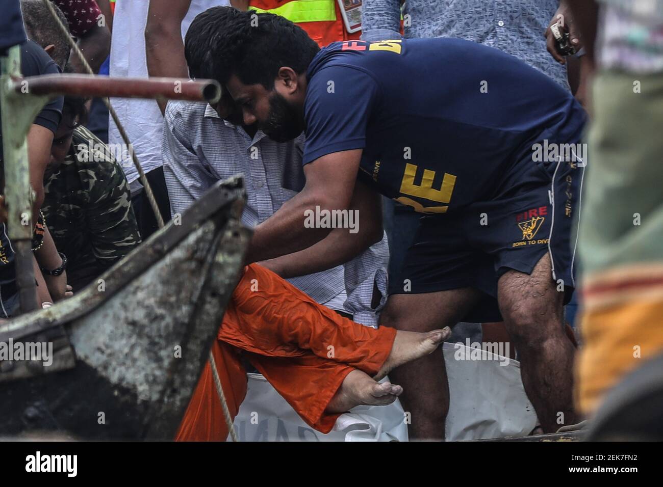 (EDITOR'S NOTE: Image depicts death) Rescue team recovering bodies from ...