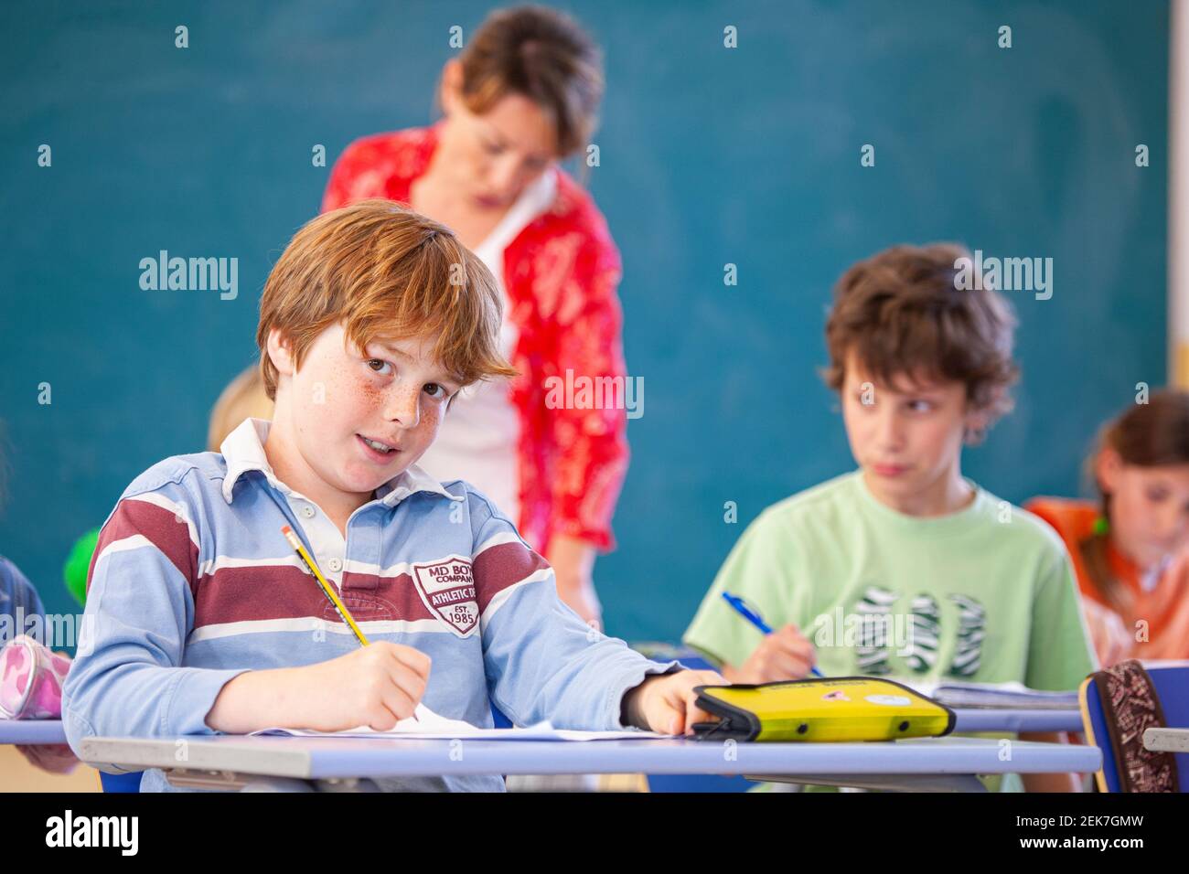 Teaching children in a school classroom Stock Photo - Alamy