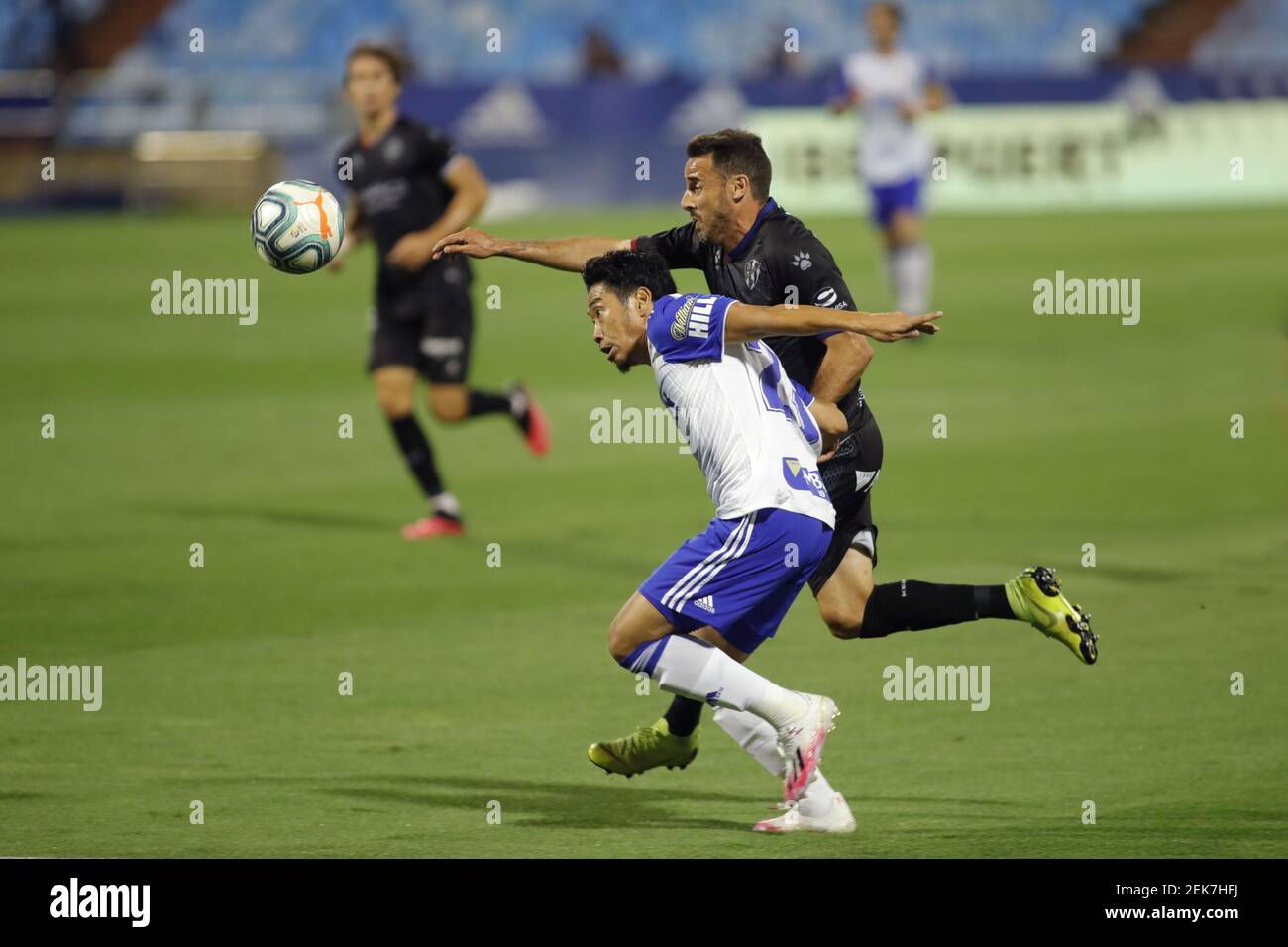 Shinji Kagawa of Real Zaragoza and Pedro Lopez of SD Huesca during the ...