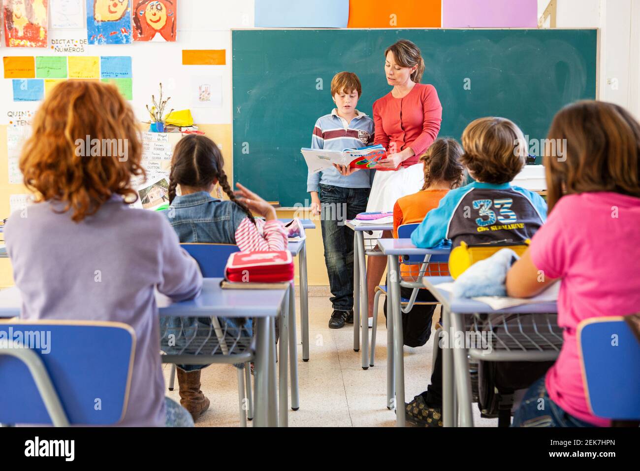 Teaching children in a school classroom Stock Photo - Alamy