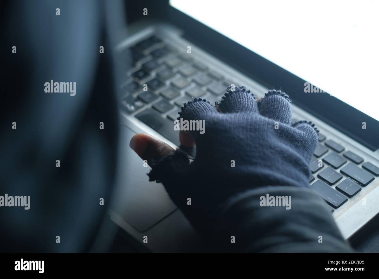 hacker hand stealing data from laptop top down Stock Photo - Alamy