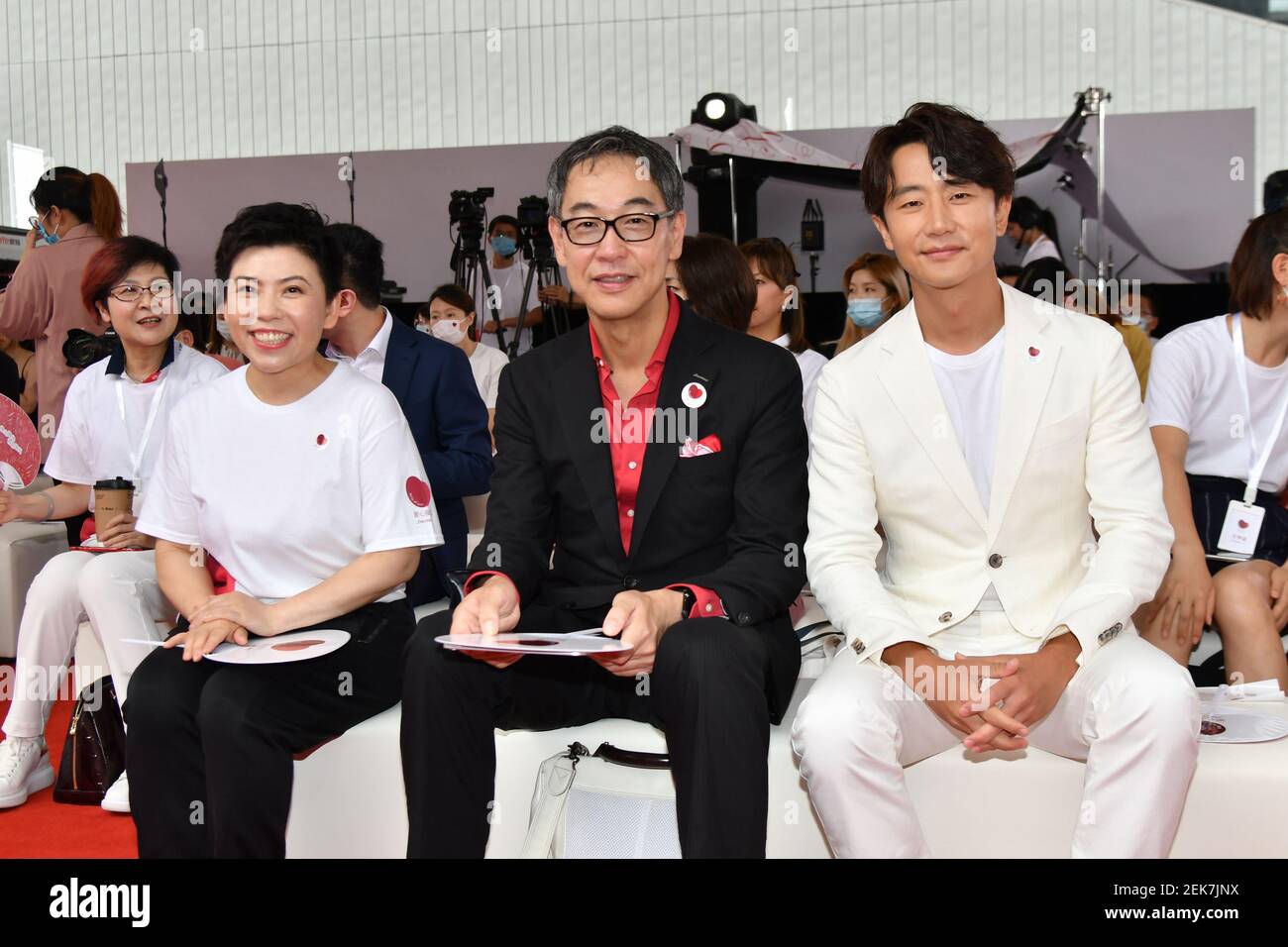 Chinese actor Huang Xuan attends a charity activity of a cosmetic brand ...