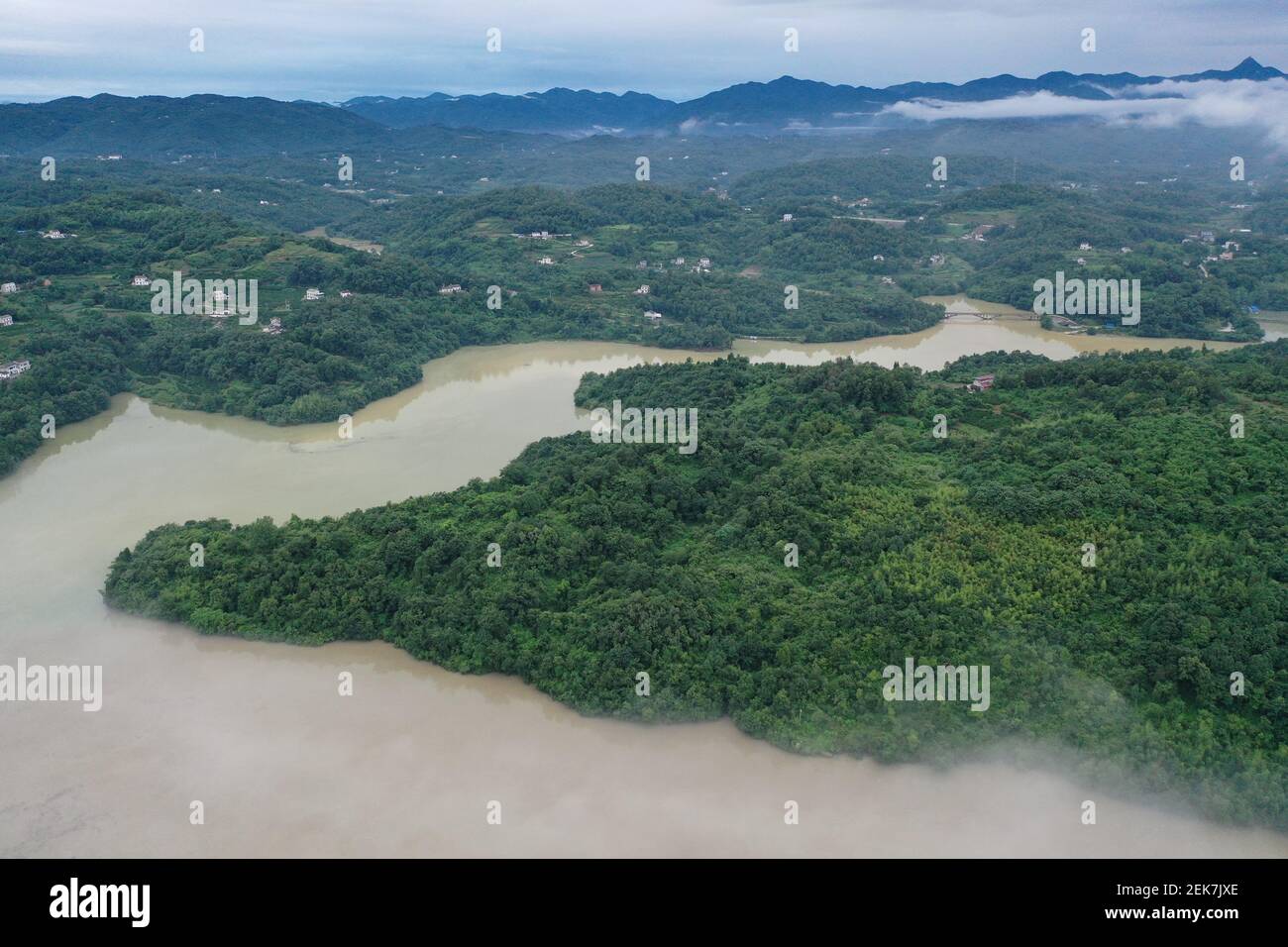 An aerial view of the confluence of Yangtze River and its branch Qing ...
