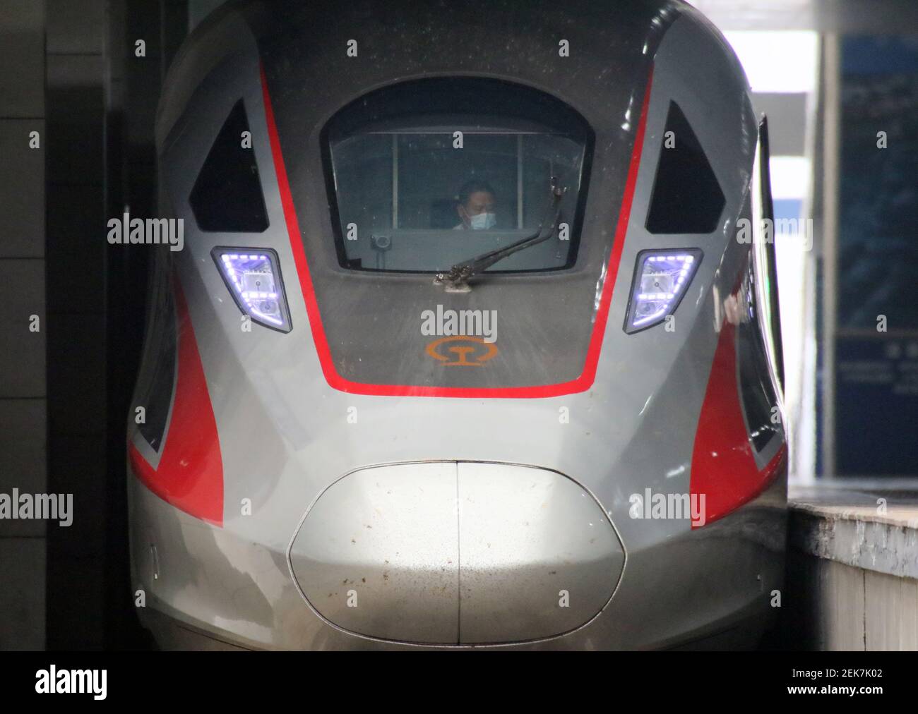 YANTAI, CHINA - JUNE 30, 2020 - A bullet train driver prepares for ...