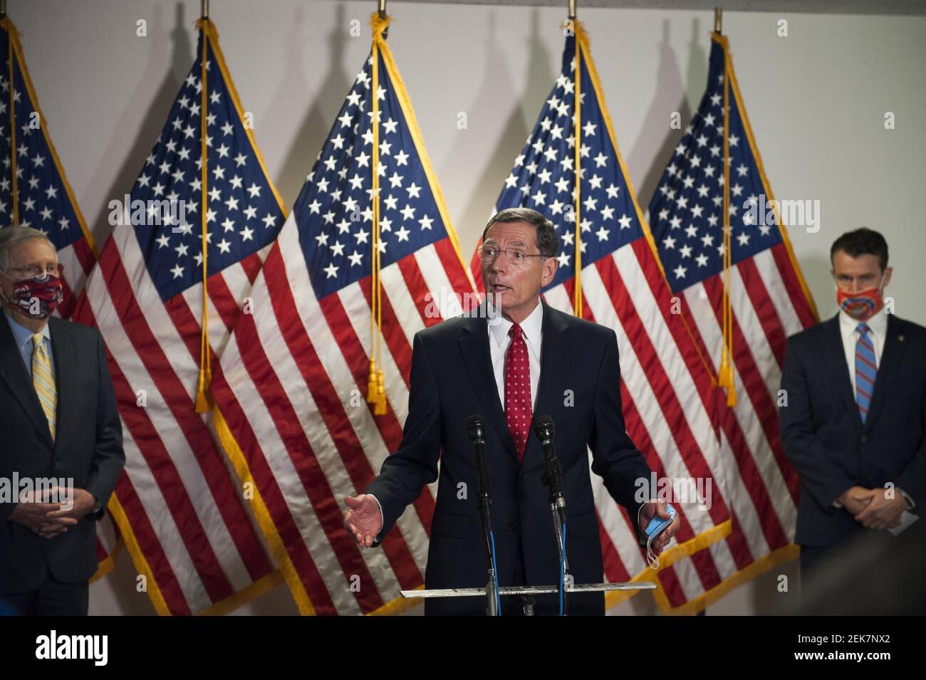 United States Senator John Barrasso (Republican of Wyoming), center ...