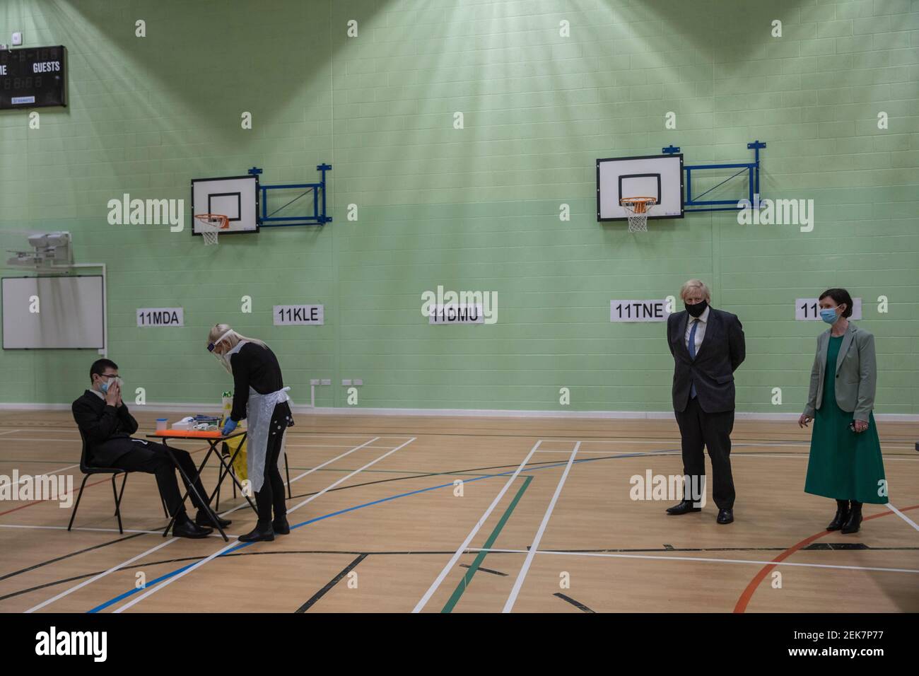Prime Minister Boris Johnson (second right) in the gym, which is being ...