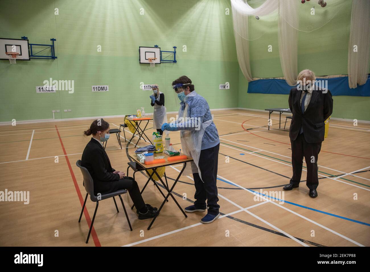 Prime Minister Boris Johnson (right) in the gym, which is being used as ...