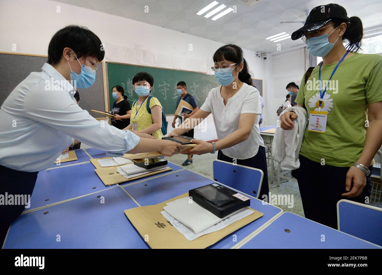 HANDAN, CHINA - JULY 7, 2020 - The invigilator receives the "college ...
