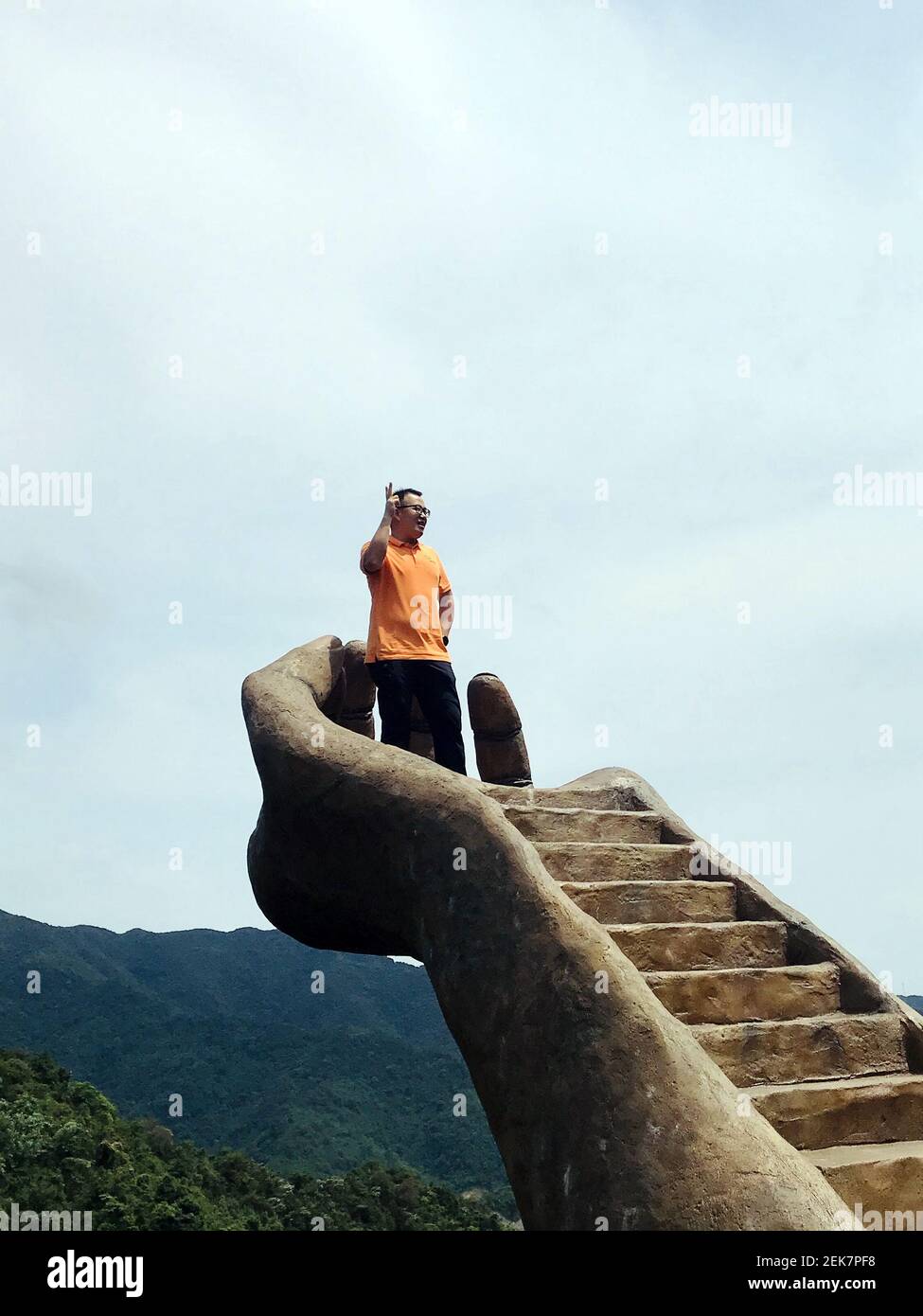Tourists take pictures at the internet-famous site of Gulong Canyon ...