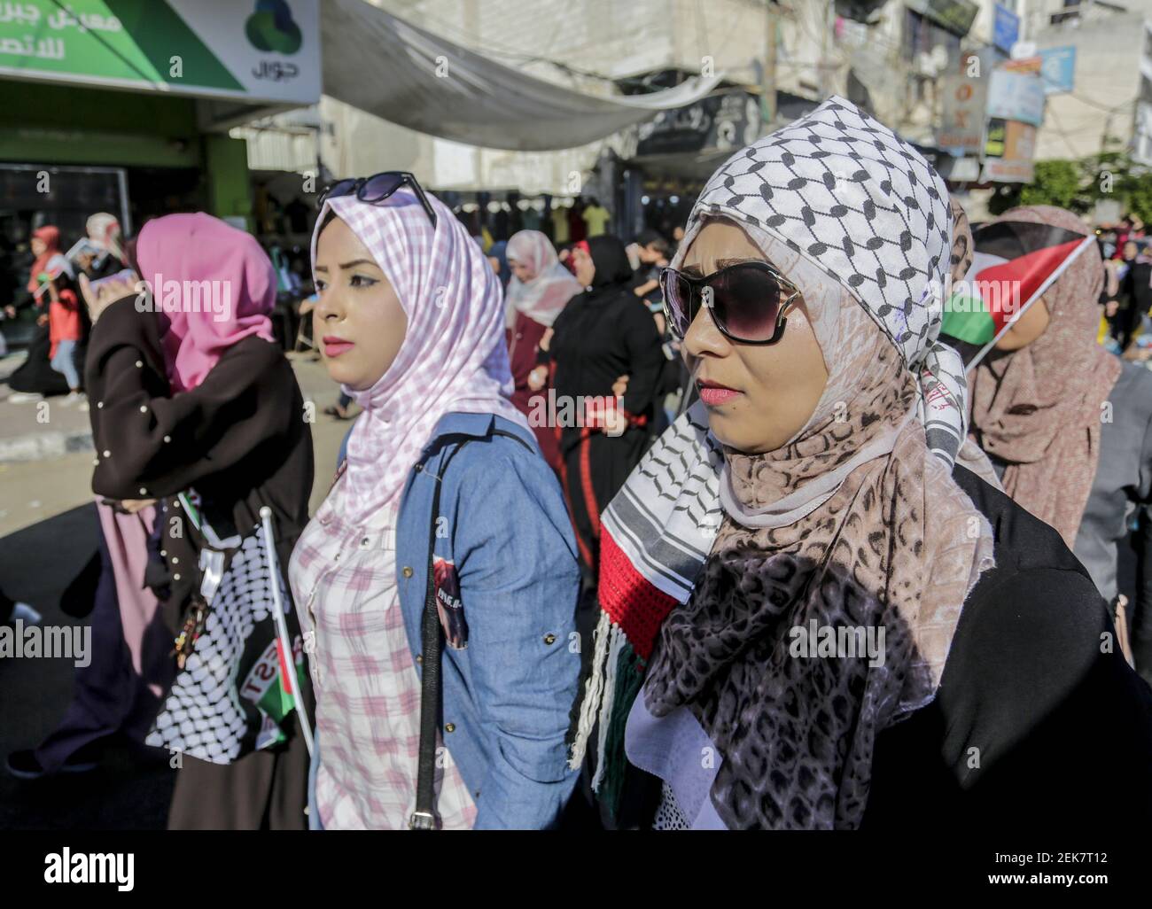 A protester wearing the Yasser Arafat signature scarf during a ...