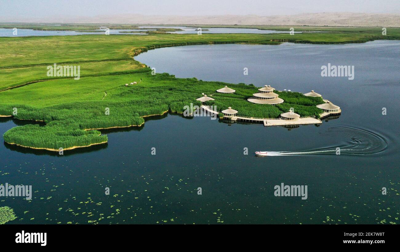 BOZHOU, CHINA - JUNE 27, 2020 - Tourists visit Bosten Lake scenic area ...