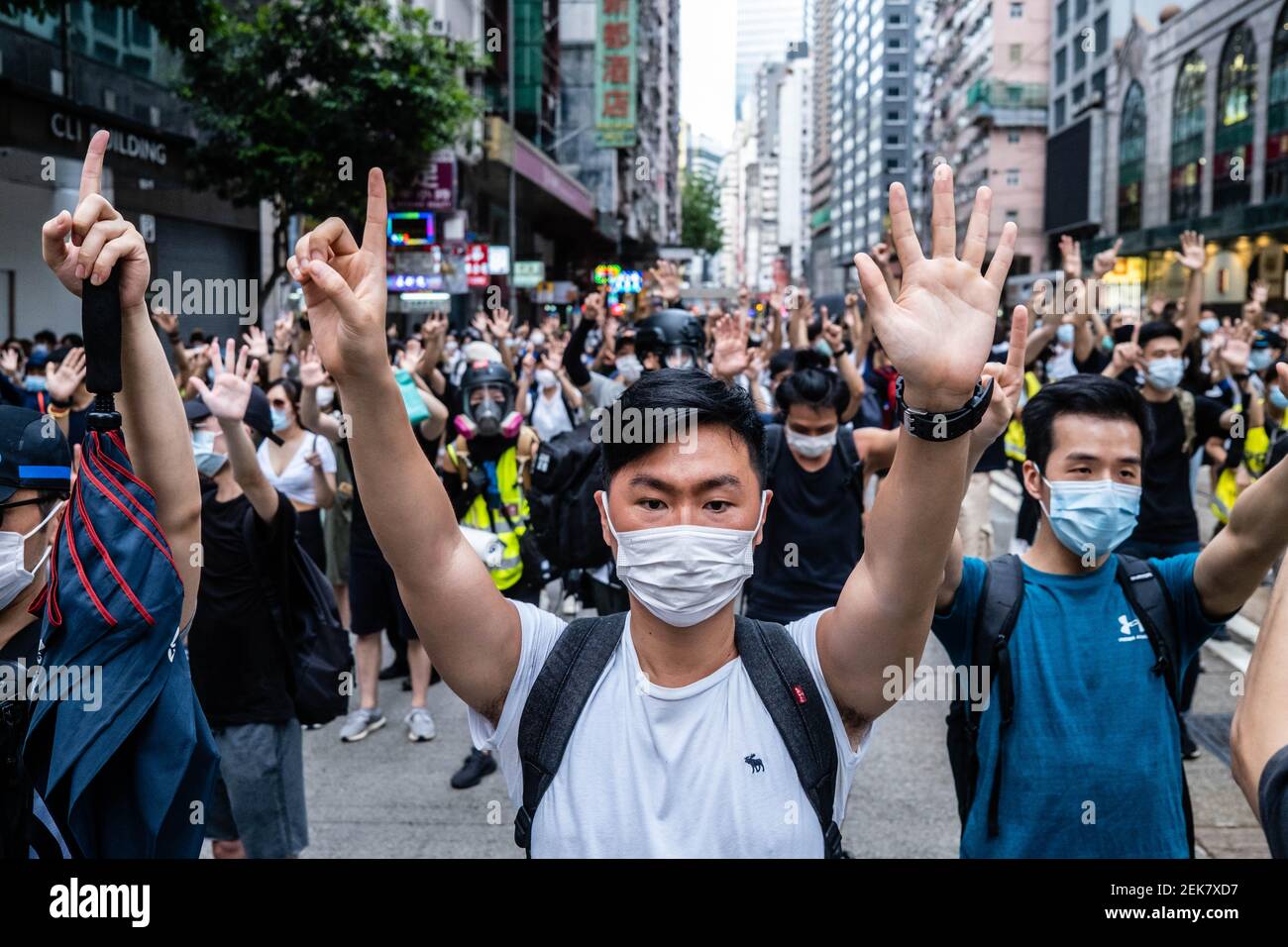 Protesters making gestures of 1 and 5 fingers, symbolising the five ...