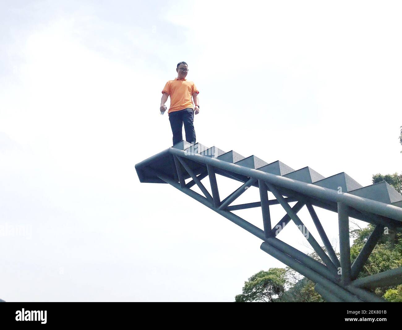 Tourists take pictures at the internet-famous site of Gulong Canyon ...